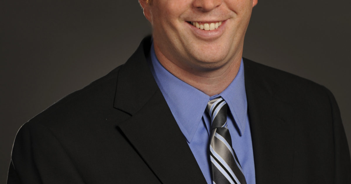 Christopher J. Ellison