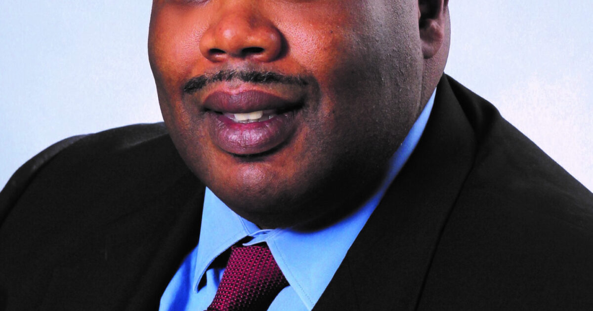 Dr. Squire J. Booker